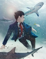 Model Fred Szkoda Swims With Sharks for HOW TO SPEND IT